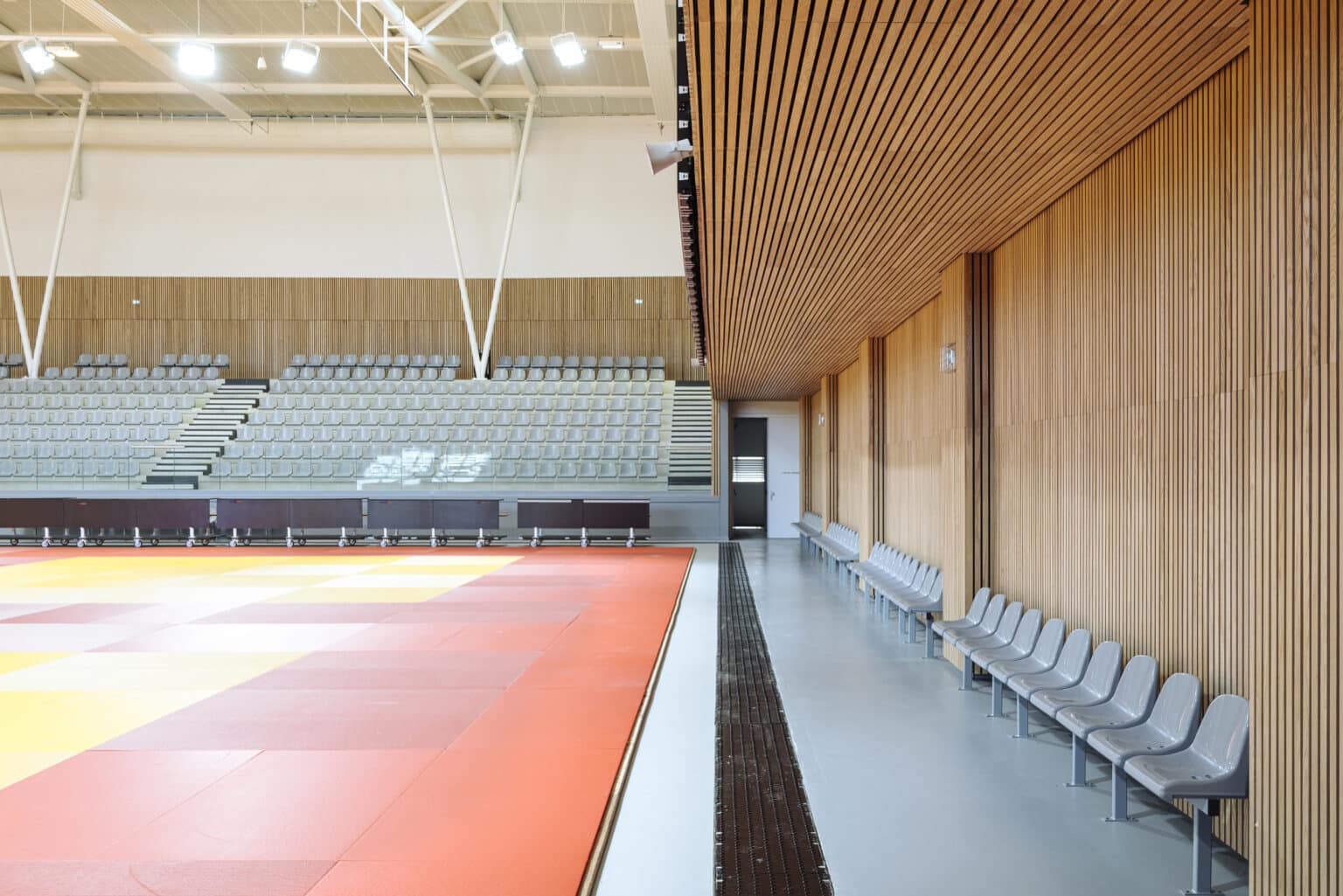 Laudescher: Elevating Olympic Infrastructure with Wood Pannels ...