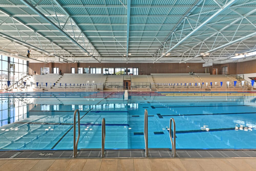 Laudescher: Elevating Olympic Infrastructure with Wood Pannels ...